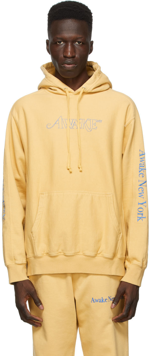 Awake NY: Yellow Classic Outline Logo Hoodie | SSENSE Canada