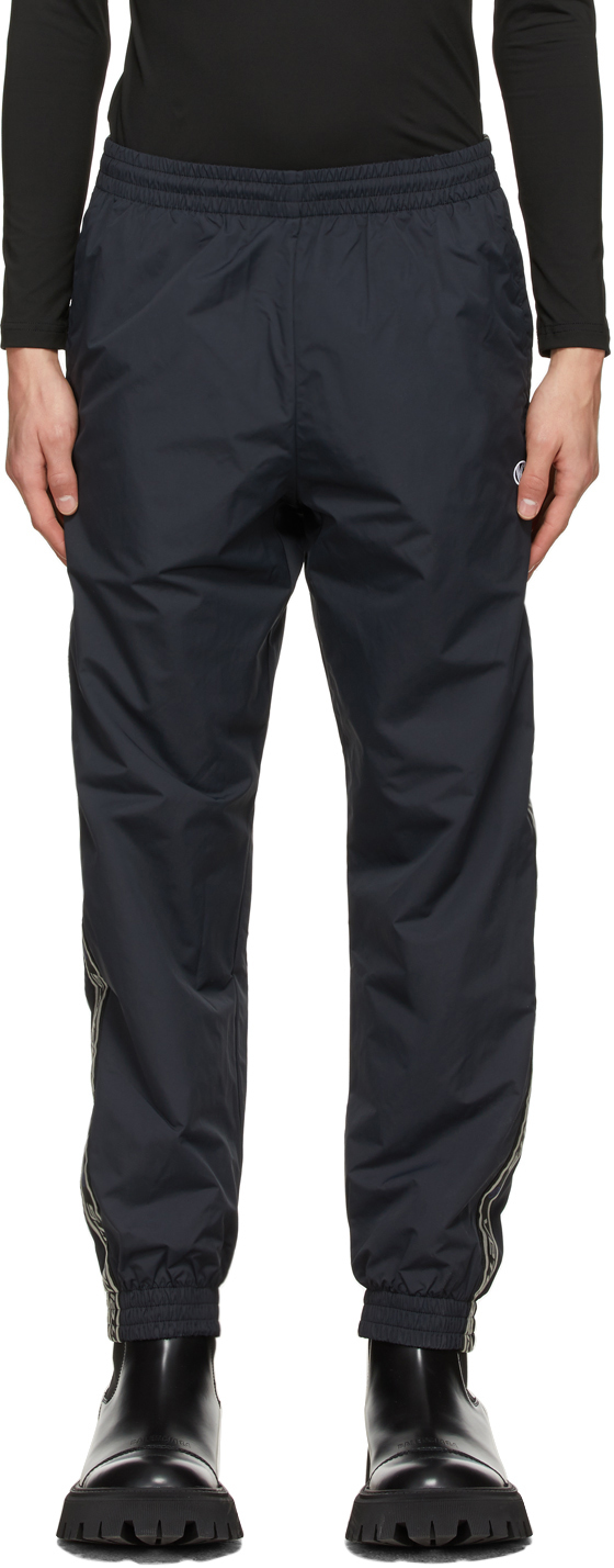 VETEMENTS: Black Logo Tape Track Pants | SSENSE Canada