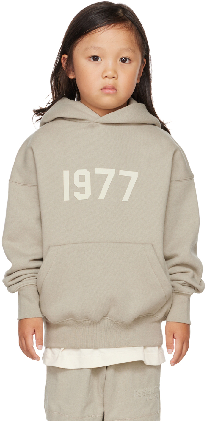 Enfant | Pull à capuche '1977' gris par Essentials | SSENSE France