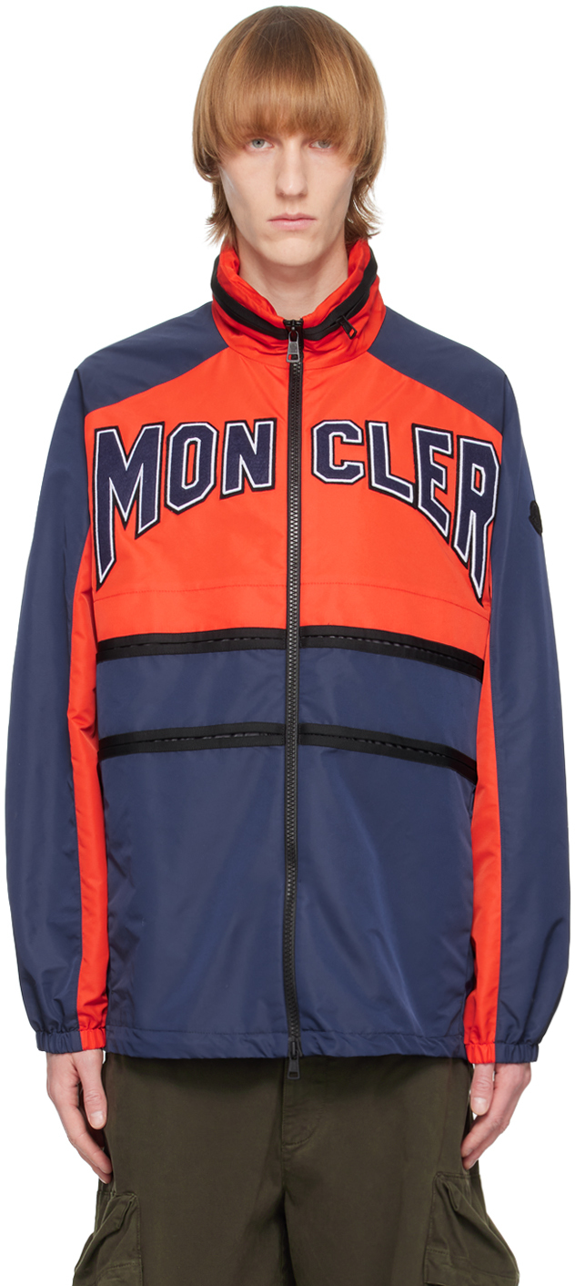 Moncler: Blouson Copernicus bleu marine et orange | SSENSE France