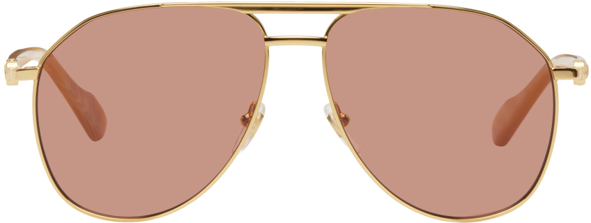 Gucci: Gold Aviator Sunglasses | SSENSE UK
