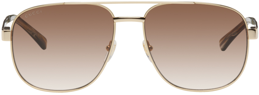Gucci: Gold Aviator Sunglasses | SSENSE UK