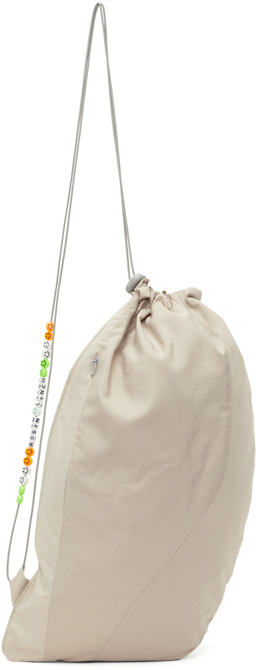 Robyn Lynch: Beige Smiley Charm Drawstring Pouch | SSENSE Canada