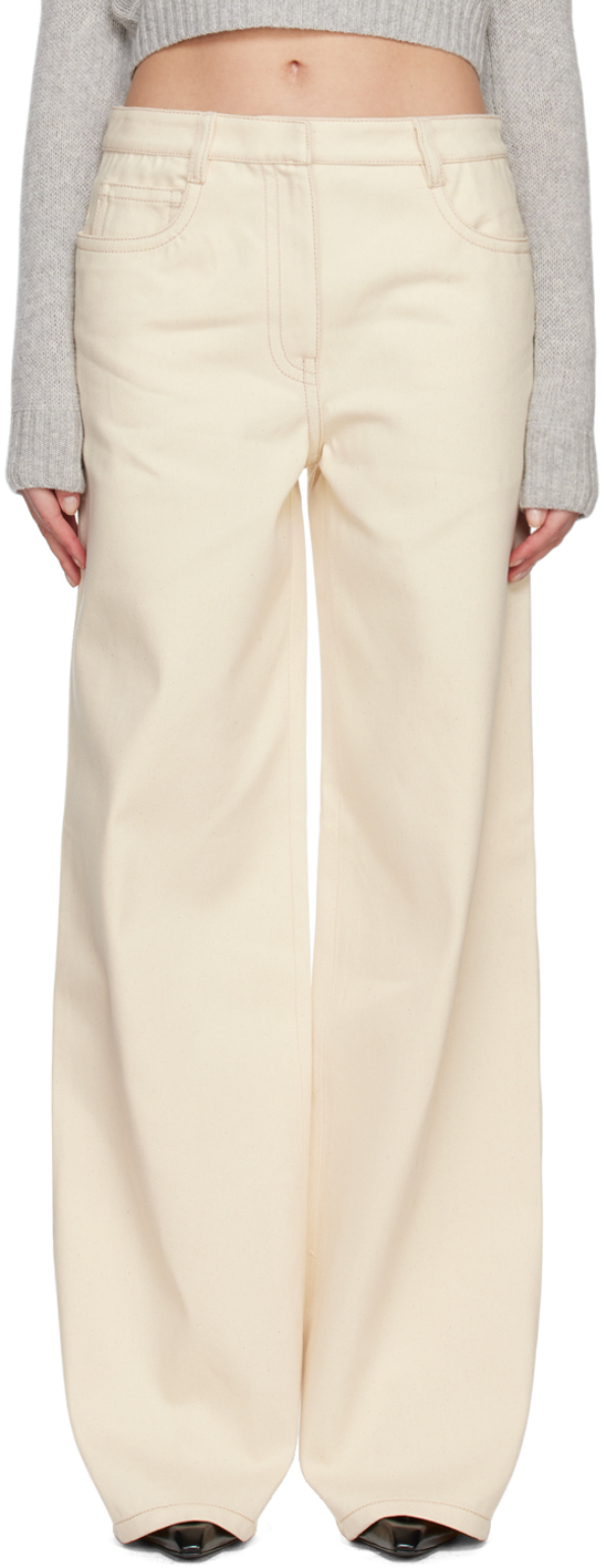 Prada: Off-White Plaque Jeans | SSENSE