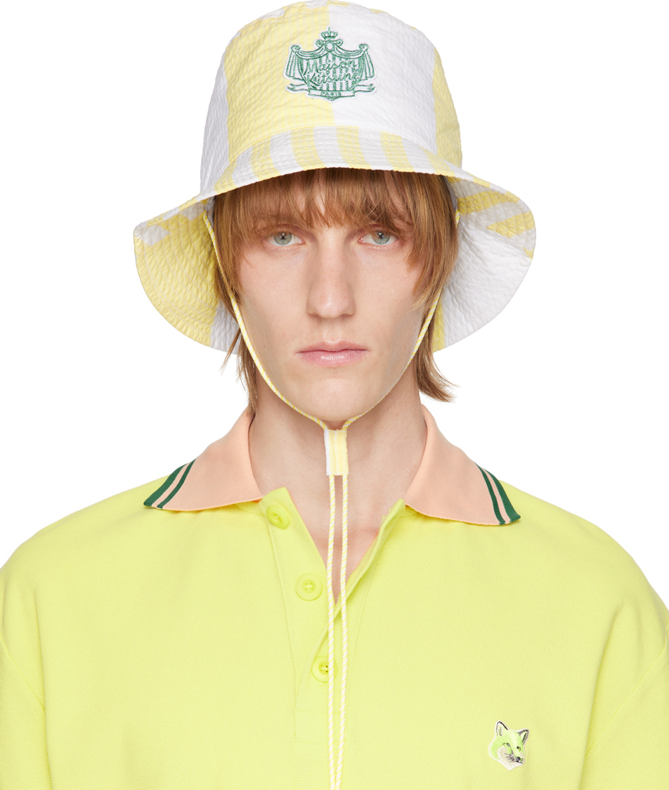 Yellow & White Hotel Olympia Edition Bucket Hat by Maison Kitsuné on Sale