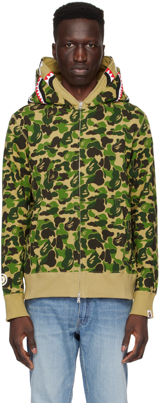BAPE: Pull à capuche étagée vert à motif camouflage ABC et à requins ...