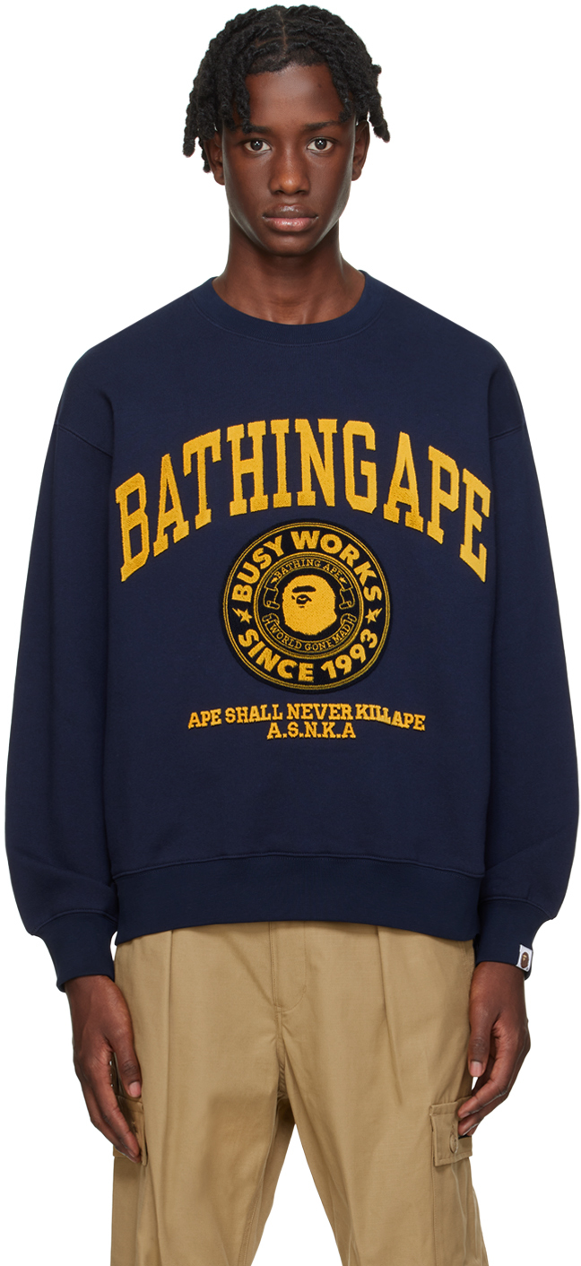 BAPE: Pull molletonné bleu marine à logo de style collégial | SSENSE France