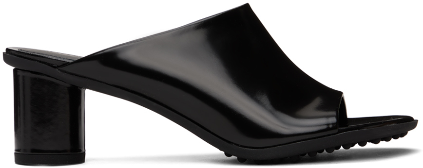 Bottega Veneta: Mules à talon Atomic noires | SSENSE France