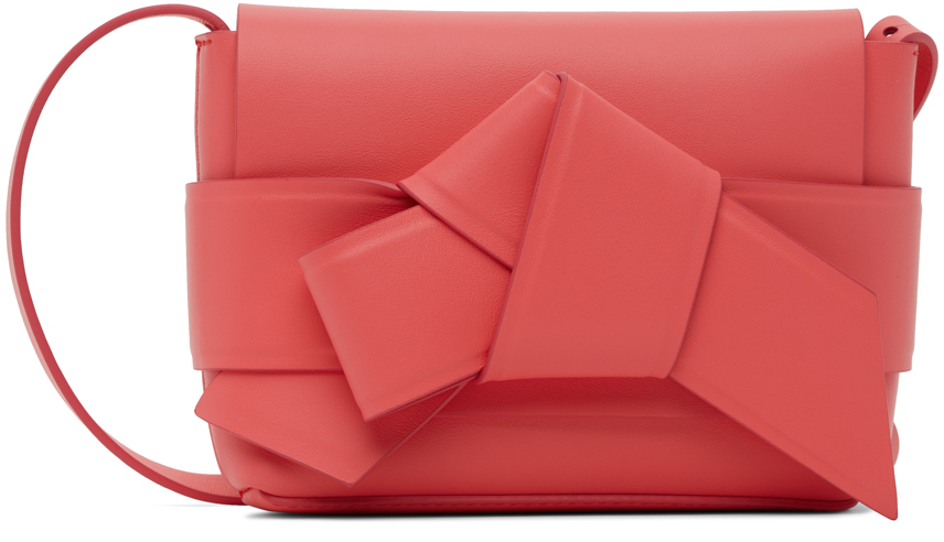 Acne Studios: Pink Musubi Mini Crossbody Bag | SSENSE UK