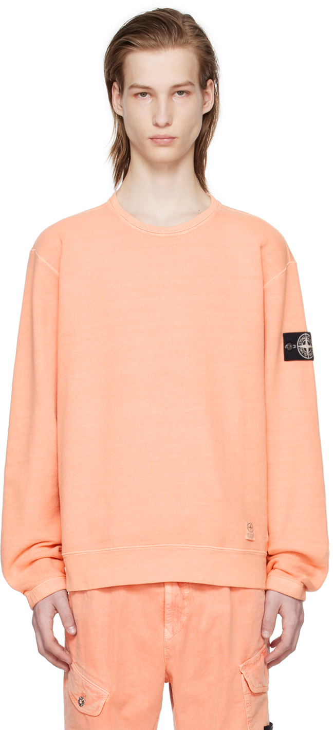 Stone Island: Pull molletonné rose à écussons | SSENSE France
