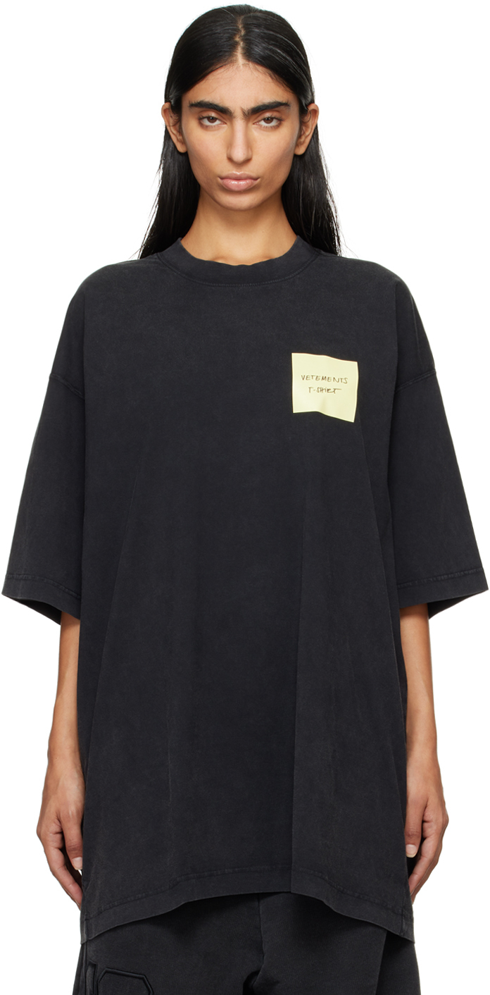 VETEMENTS: Black Sticker T-Shirt | SSENSE
