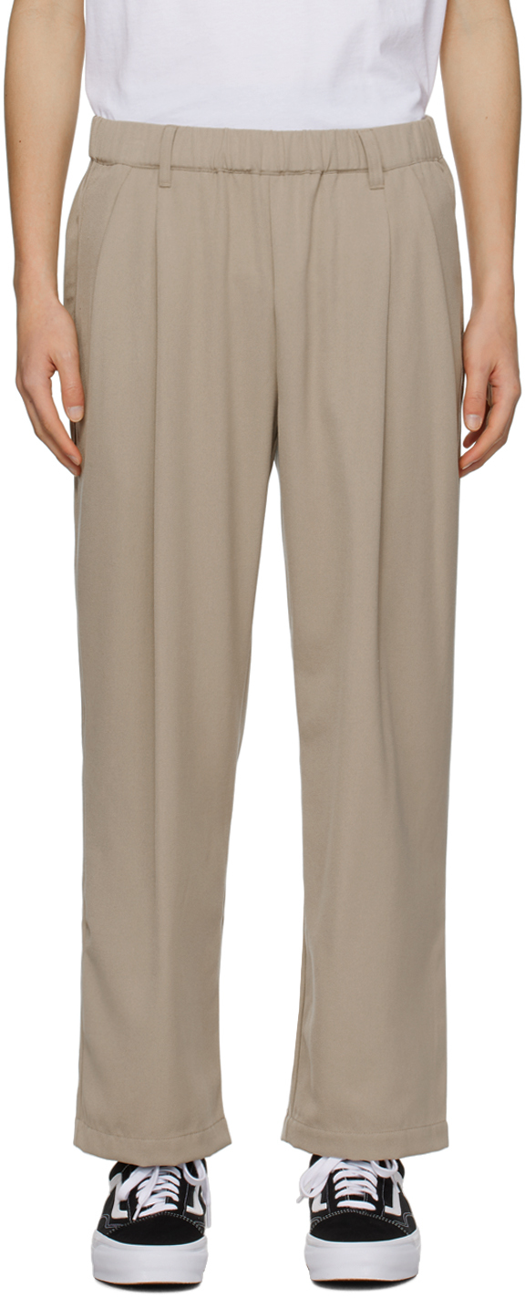 Tan Pleated Trousers by Dime on Sale