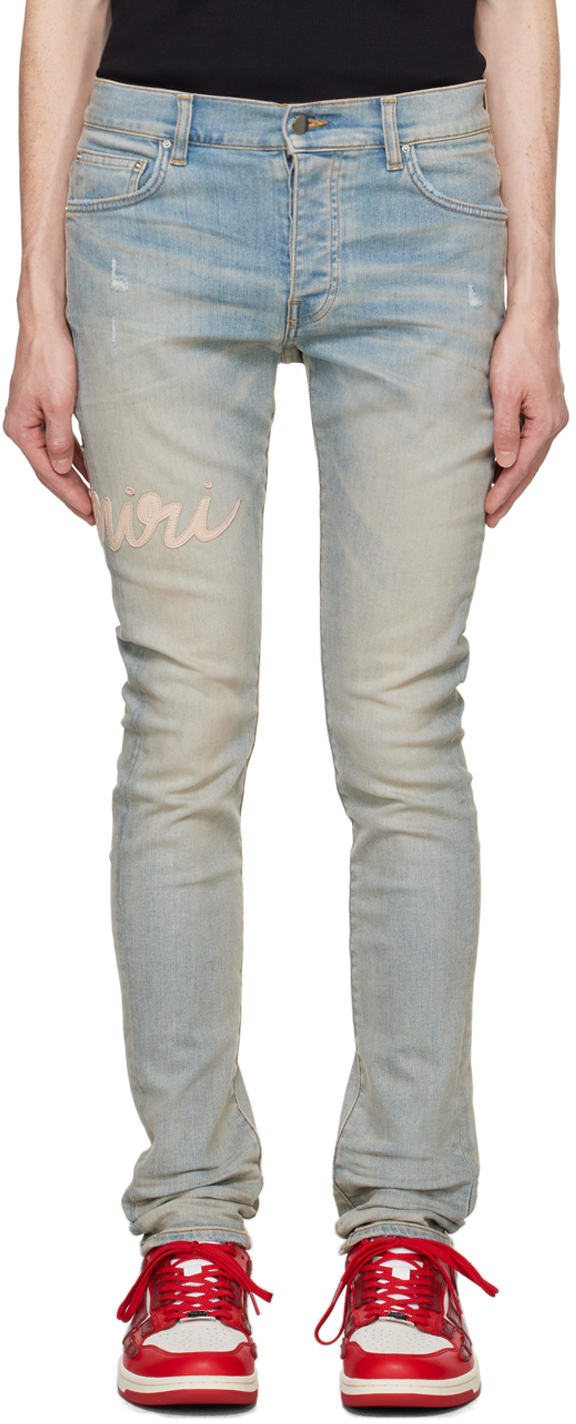 Blue Script Logo Skinny Jeans by AMIRI on Sale